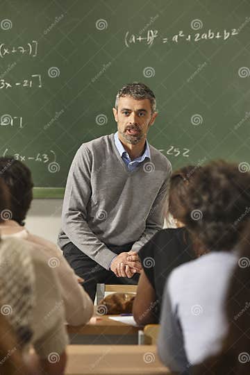 Math Teacher Giving Lessons. Classroom with Students. Elementary ...