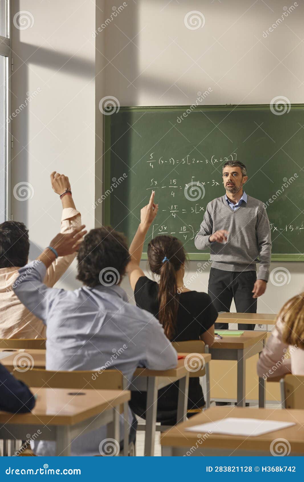 Math Teacher Giving Lessons. Classroom with Students. Elementary ...