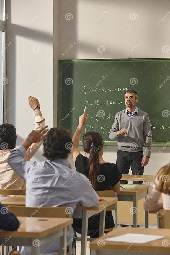 Math Teacher Giving Lessons. Classroom with Students. Elementary ...