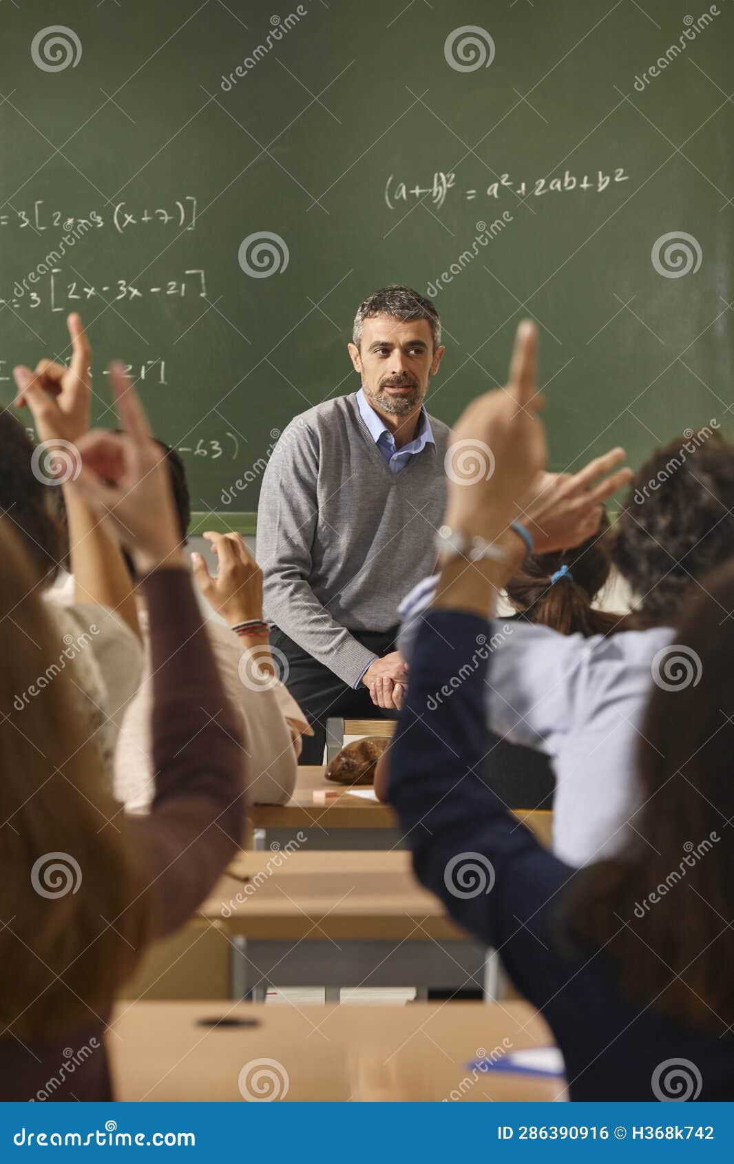 Math Teacher Giving Lessons. Classroom with Students. Elementary ...