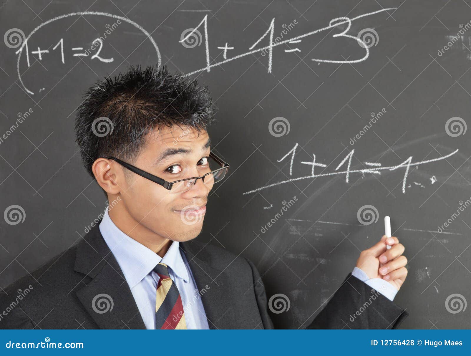 Math Teacher Writing Function, Equation Or Calculation On Blackboard In ... Math Teacher Writing Function, Equation Or Calculation On Blackboard In ...