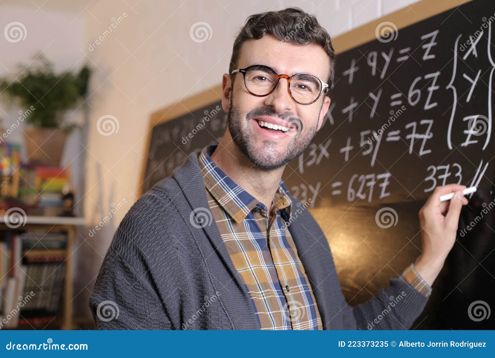 Math Teacher Writing with Chalk in Classroom Stock Image - Image of ...