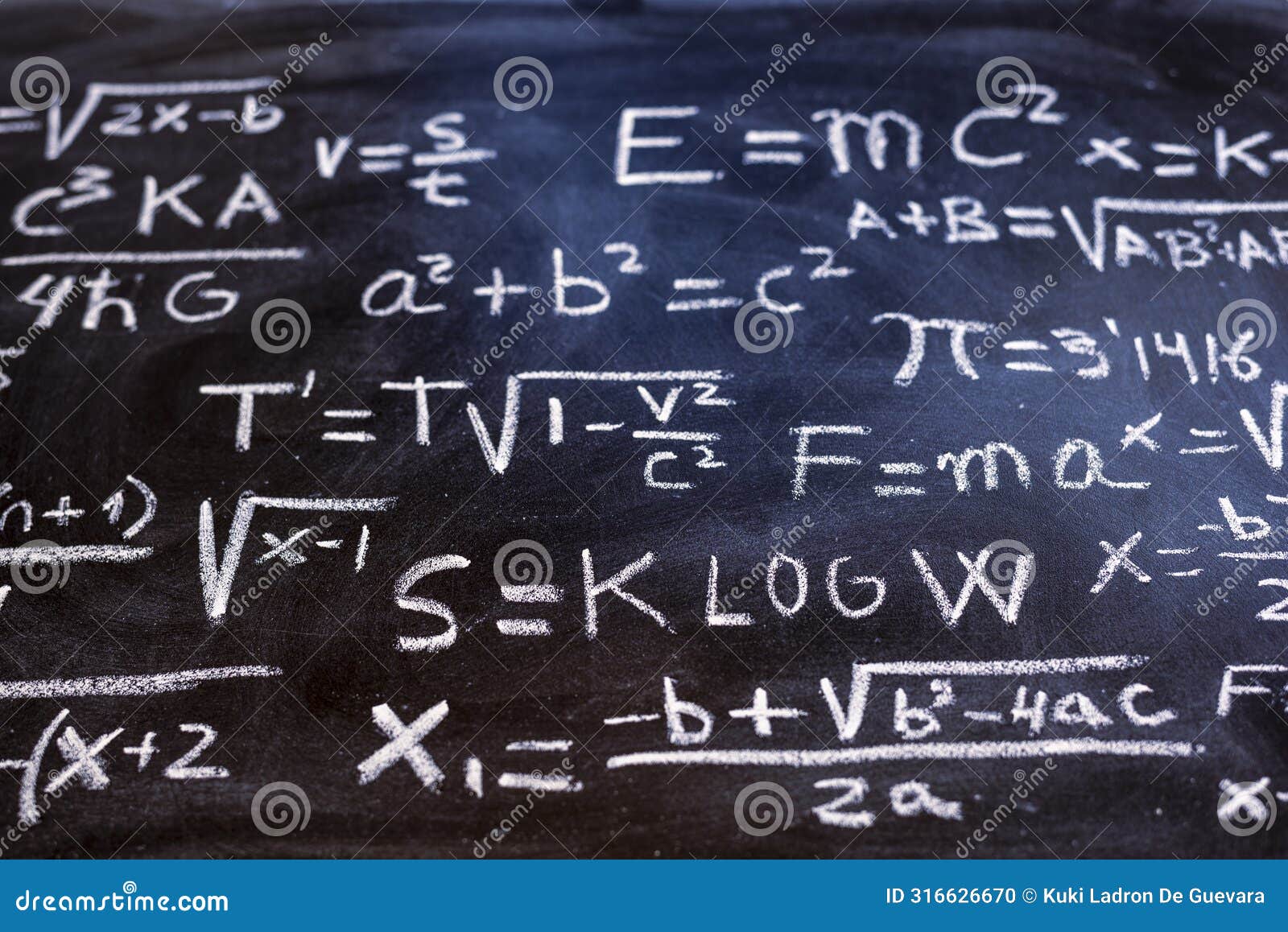 Mathematical Equations and Physics Formulas Handwritten on Blackboard ...