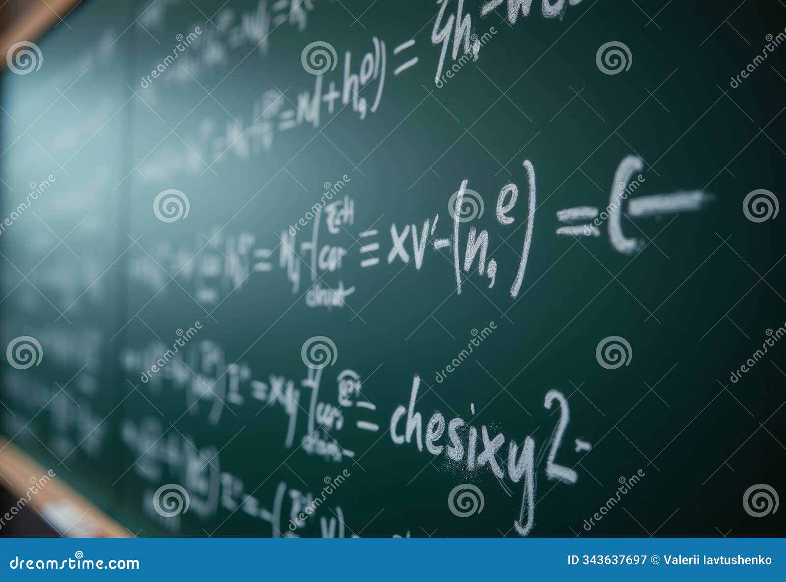 Mathematical Equations Written in Chalk on a Green Chalkboard in an ...