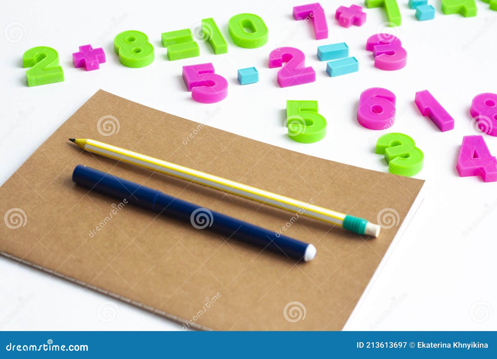 Mathematical Exercises, Notebook, Pen and Pencil on a White Background ...