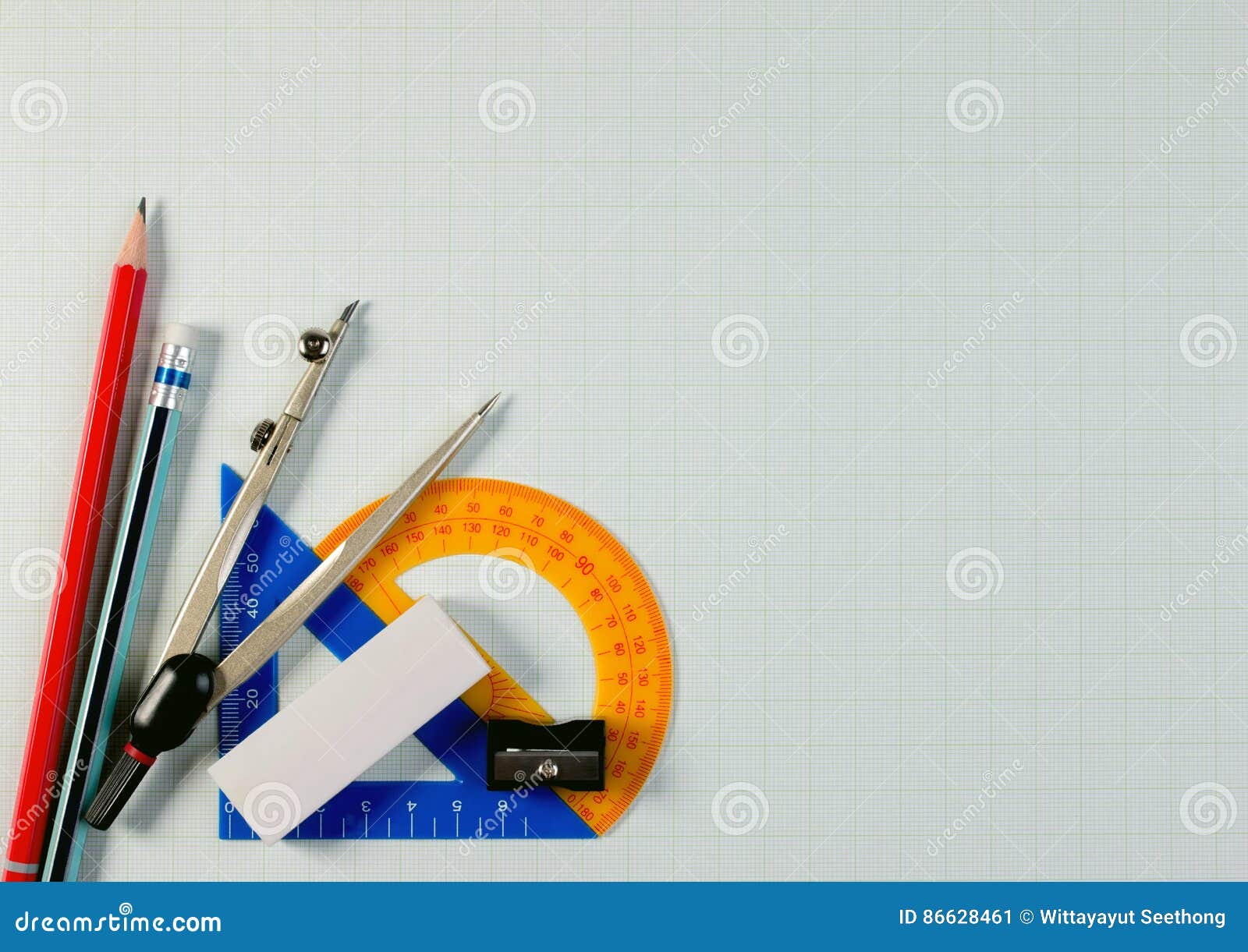 Mathematical Instruments Over the Corner of a Math Graph Paper with ...
