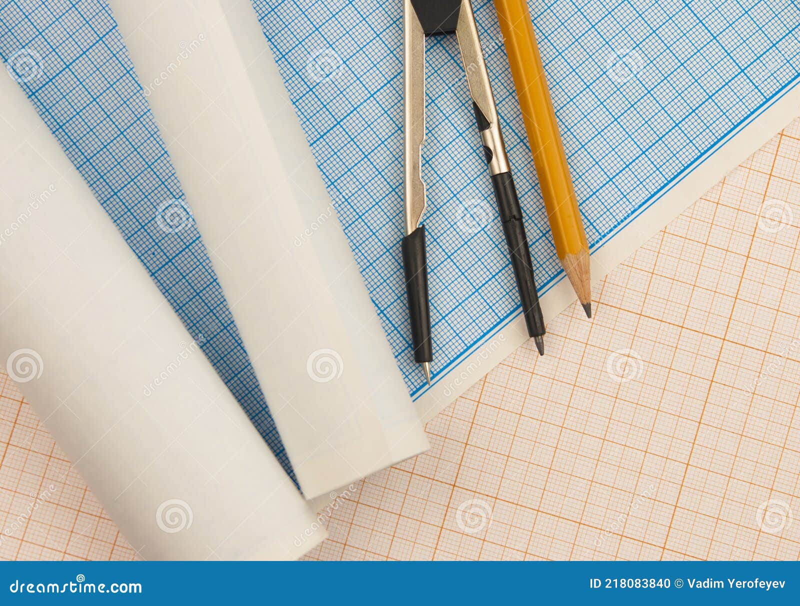 Mathematical Instruments Over the Corner of a Math Graph Paper with ...
