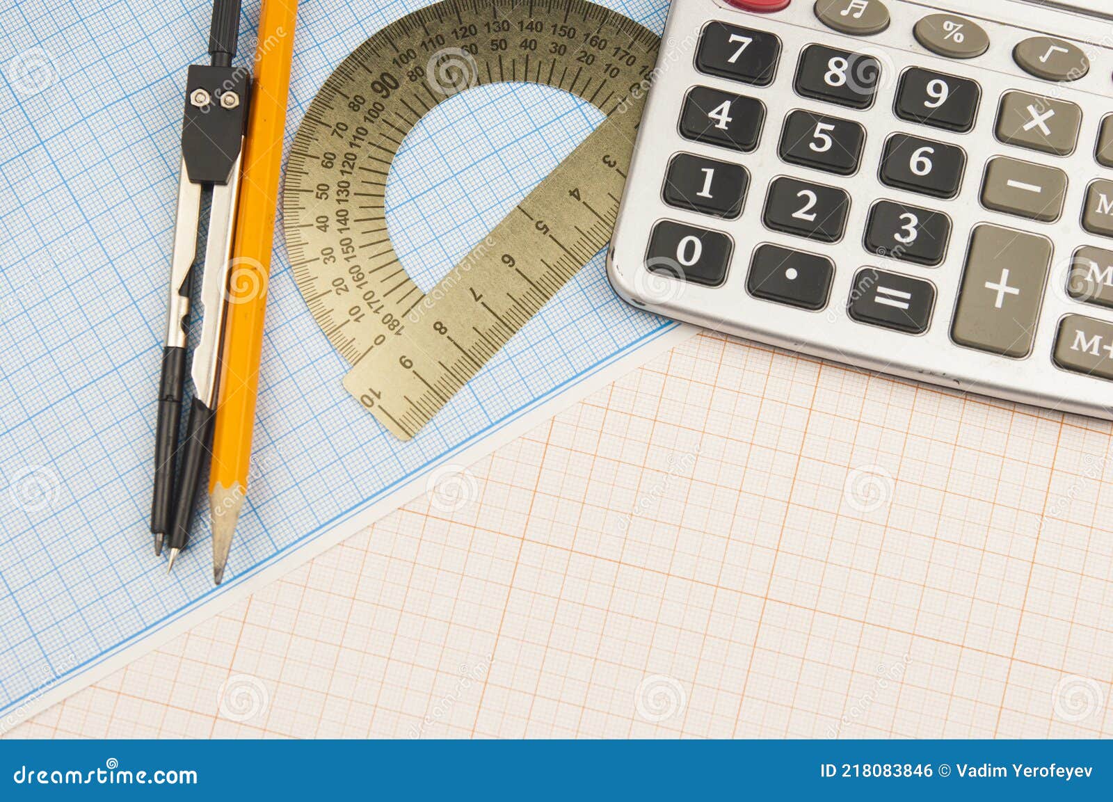 Mathematical Instruments Over the Corner of a Math Graph Paper with ...