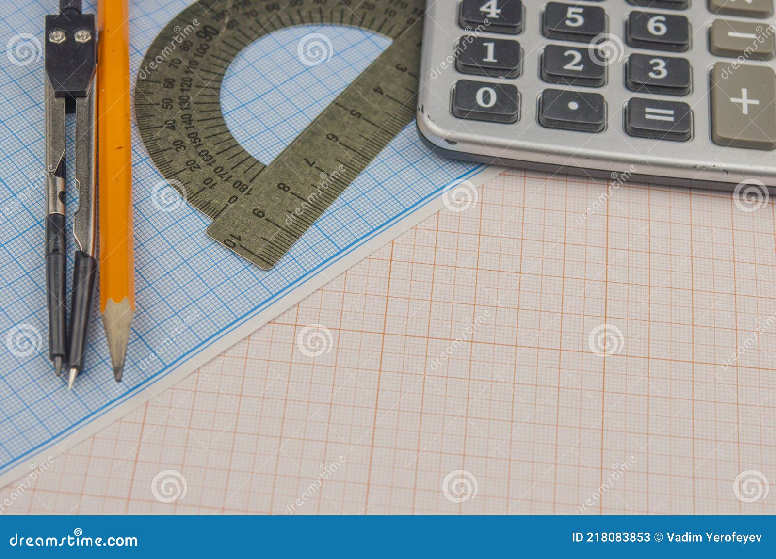 Mathematical Instruments Over the Corner of a Math Graph Paper with ...