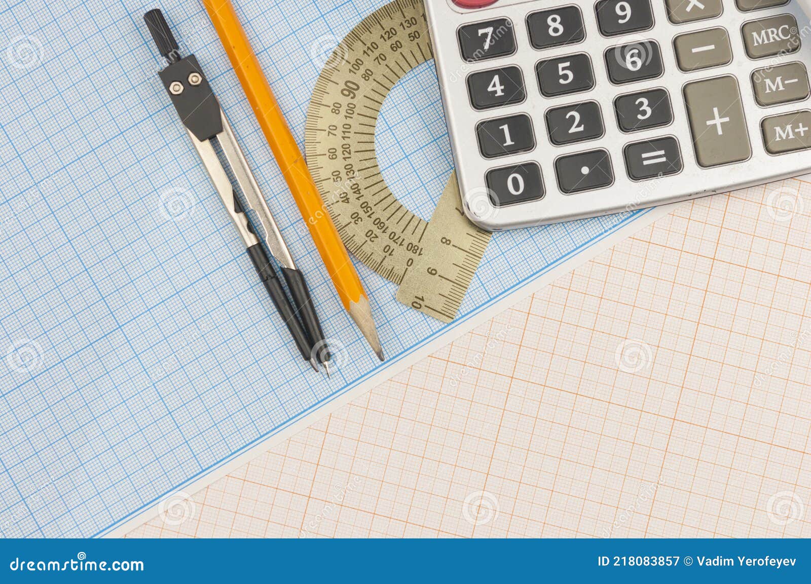 Mathematical Instruments Over the Corner of a Math Graph Paper with ...