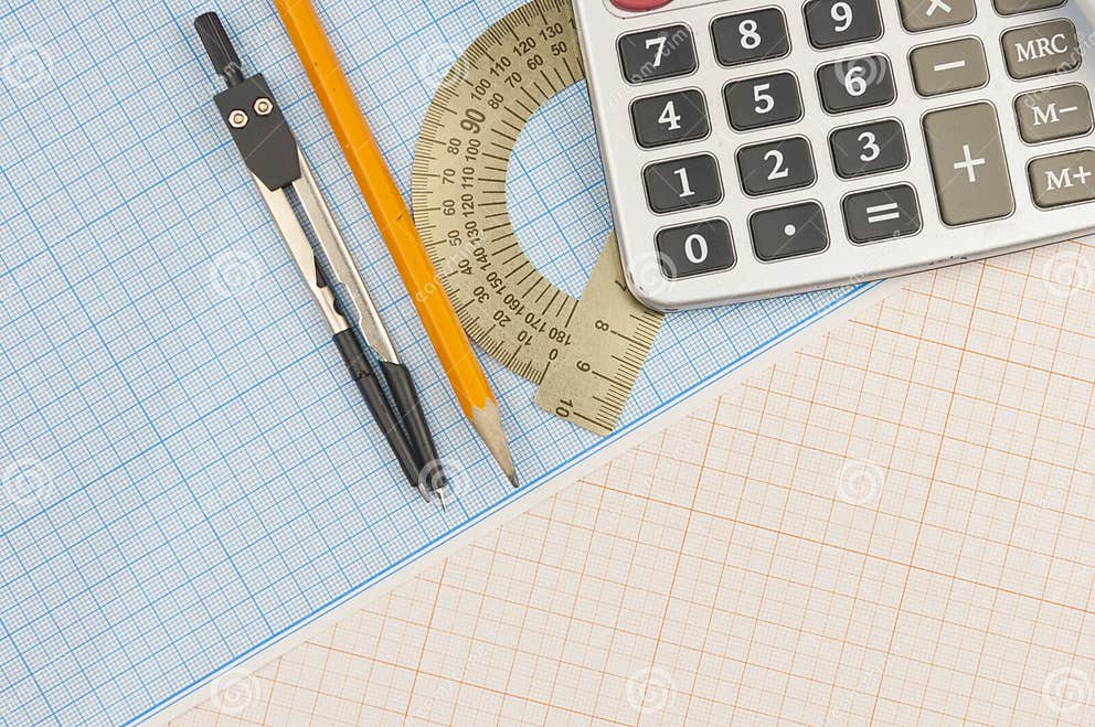 Mathematical Instruments Over the Corner of a Math Graph Paper with ...