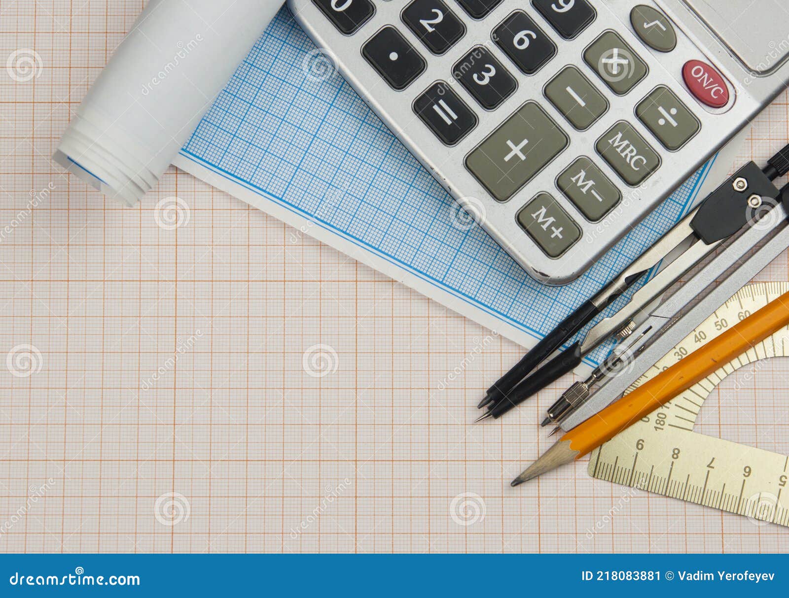 Mathematical Instruments Over the Corner of a Math Graph Paper with ...