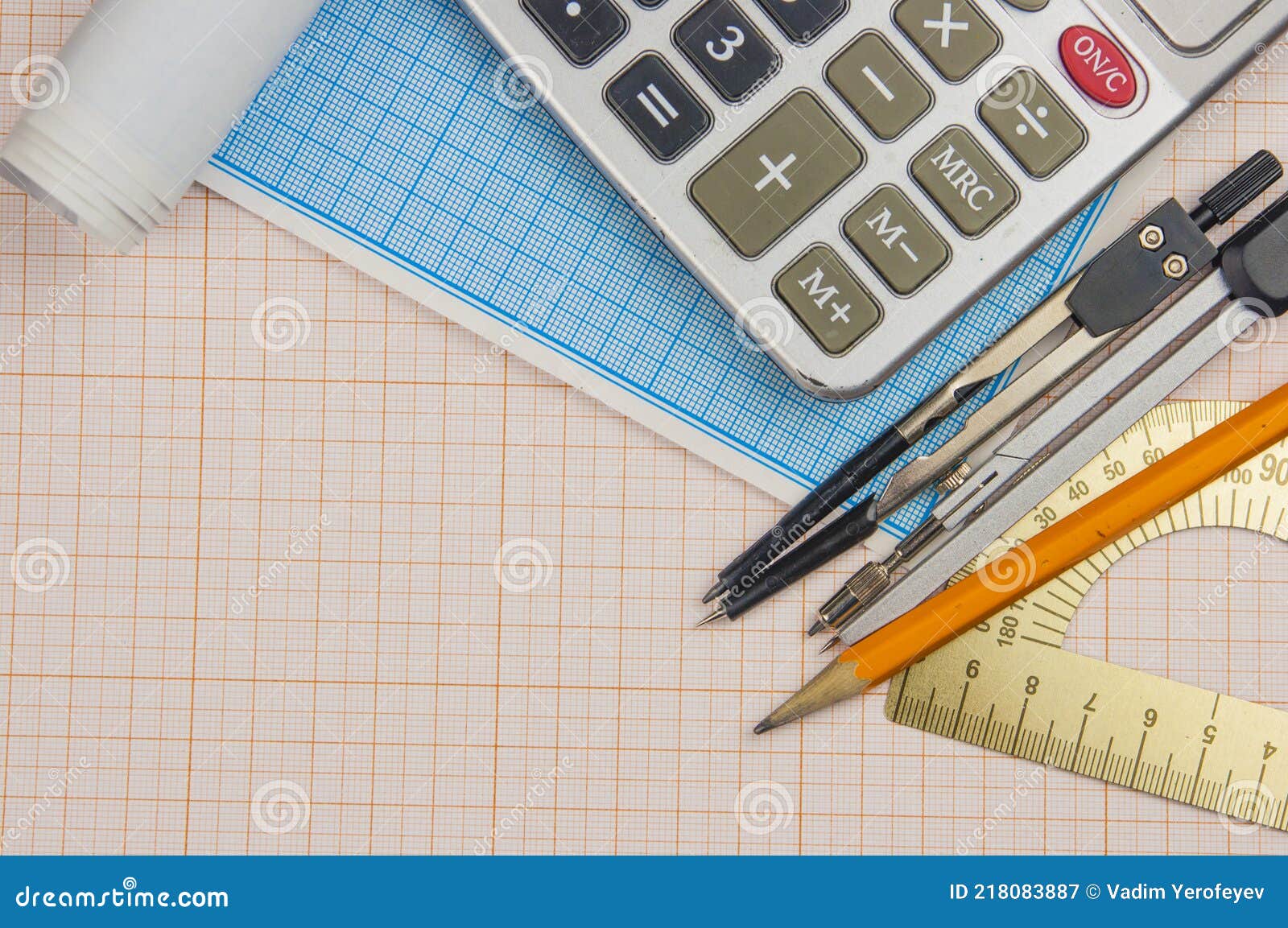 Mathematical Instruments Over the Corner of a Math Graph Paper with ...