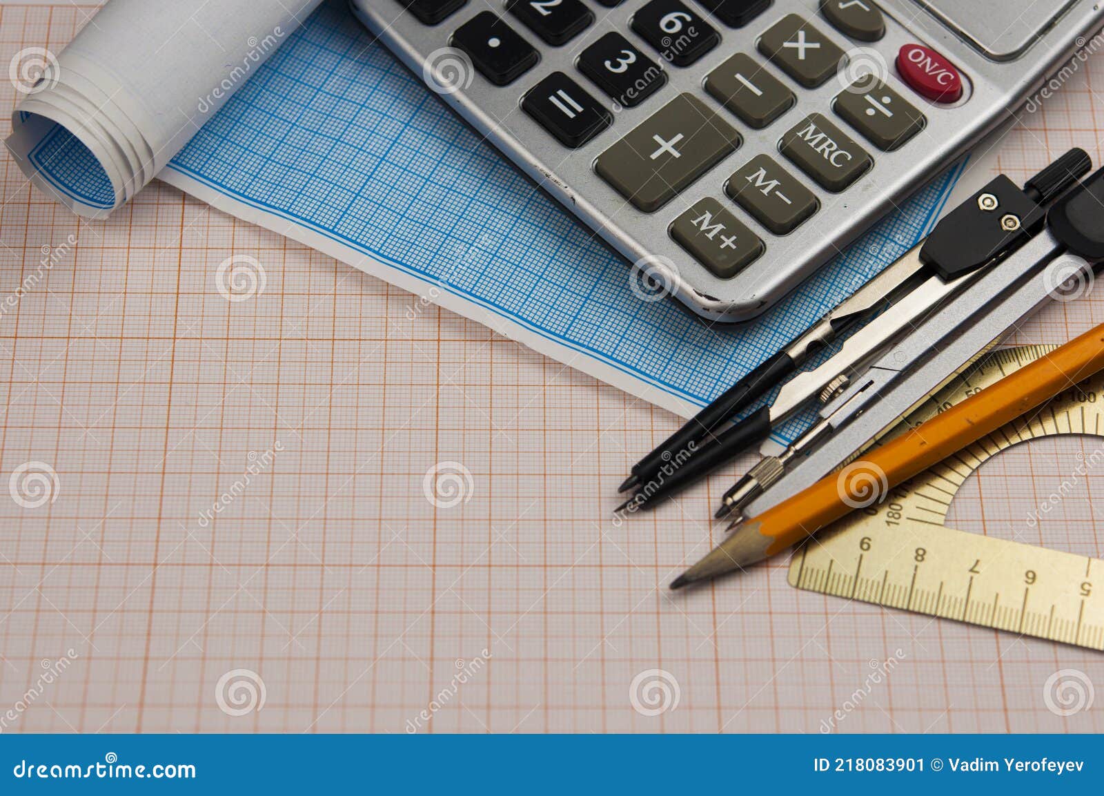 Mathematical Instruments Over the Corner of a Math Graph Paper with ...