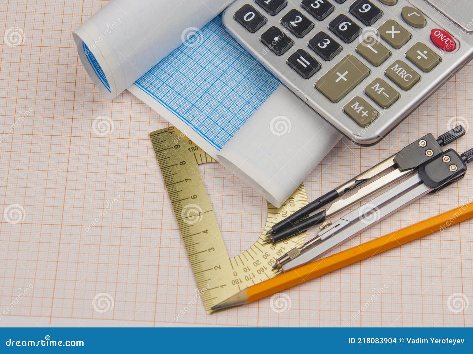 Mathematical Instruments Over the Corner of a Math Graph Paper with ...