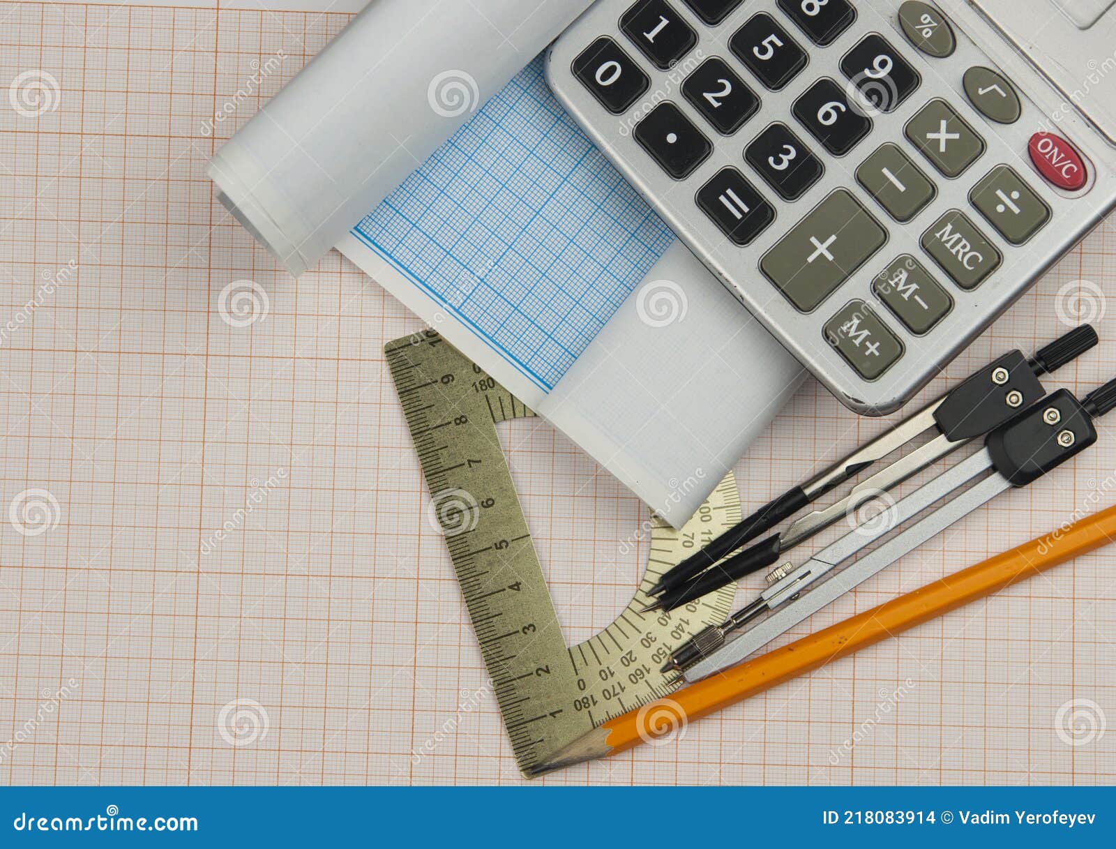 Mathematical Instruments Over the Corner of a Math Graph Paper with ...