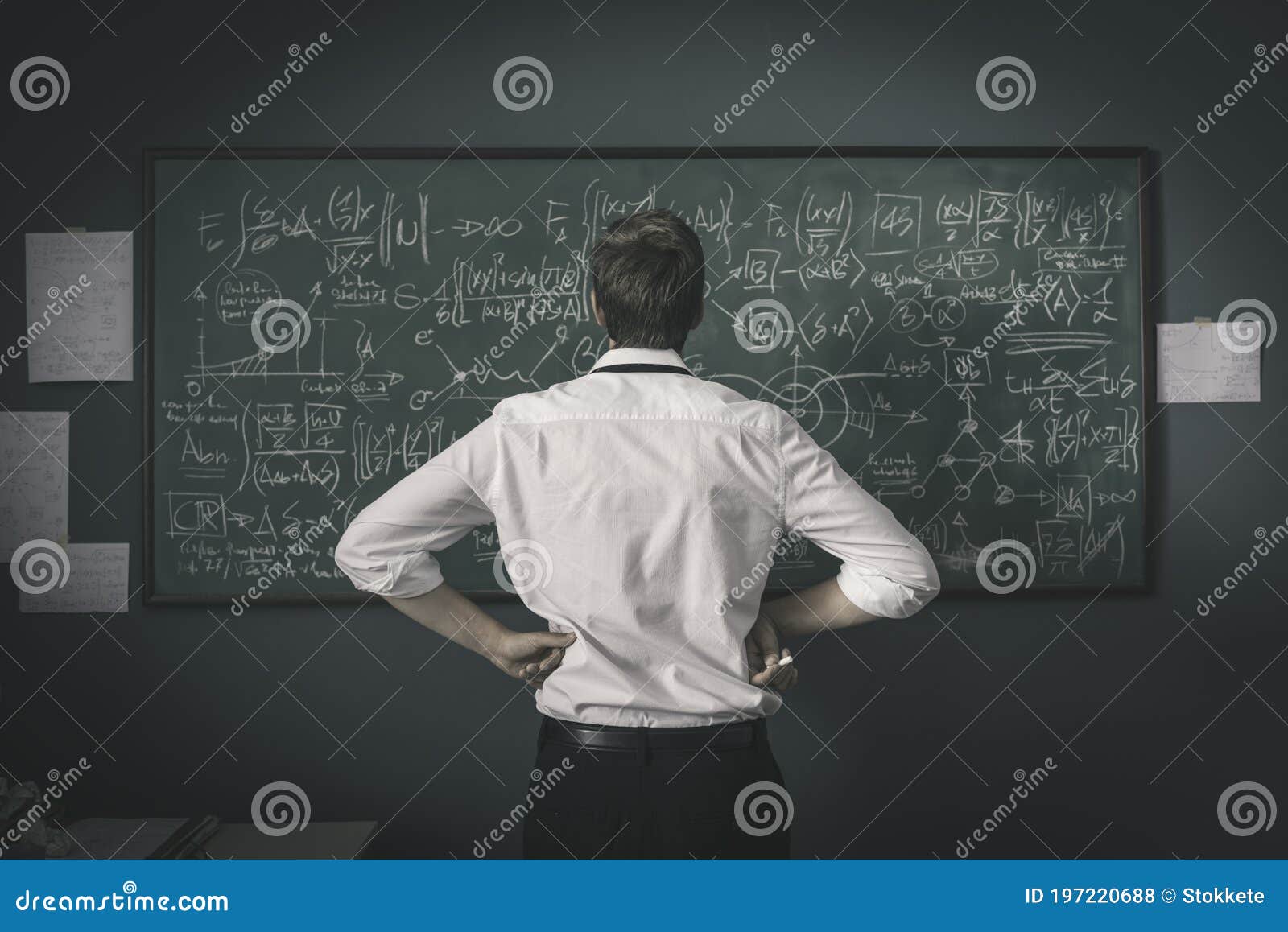 Mathematician Solving Problems and Writing Formulas on the Chalkboard ... Mathematician Solving Problems and Writing Formulas on the Chalkboard ...