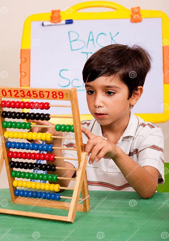 Mathematics lesson stock photo. Image of abacus, preschooler - 15822640