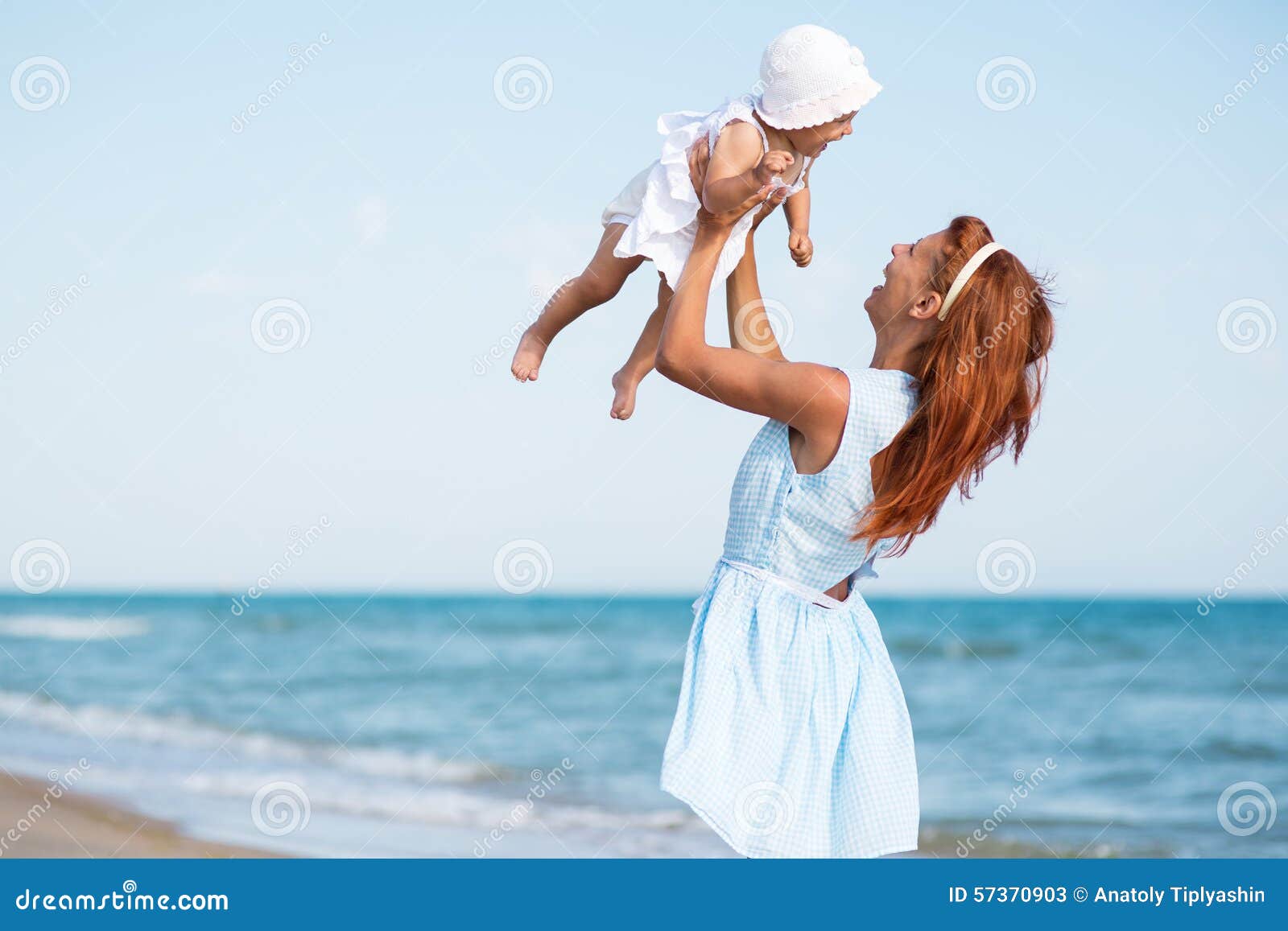 Mather and baby on the sea stock image. Image of child - 57370903