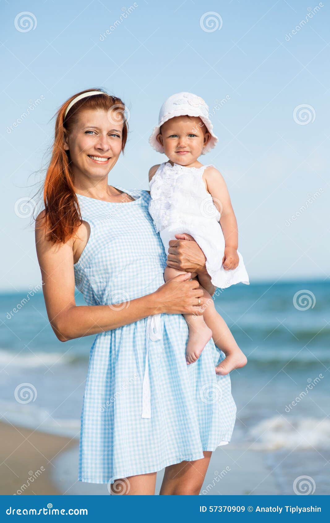 Mather and baby on the sea stock image. Image of kids - 57370909