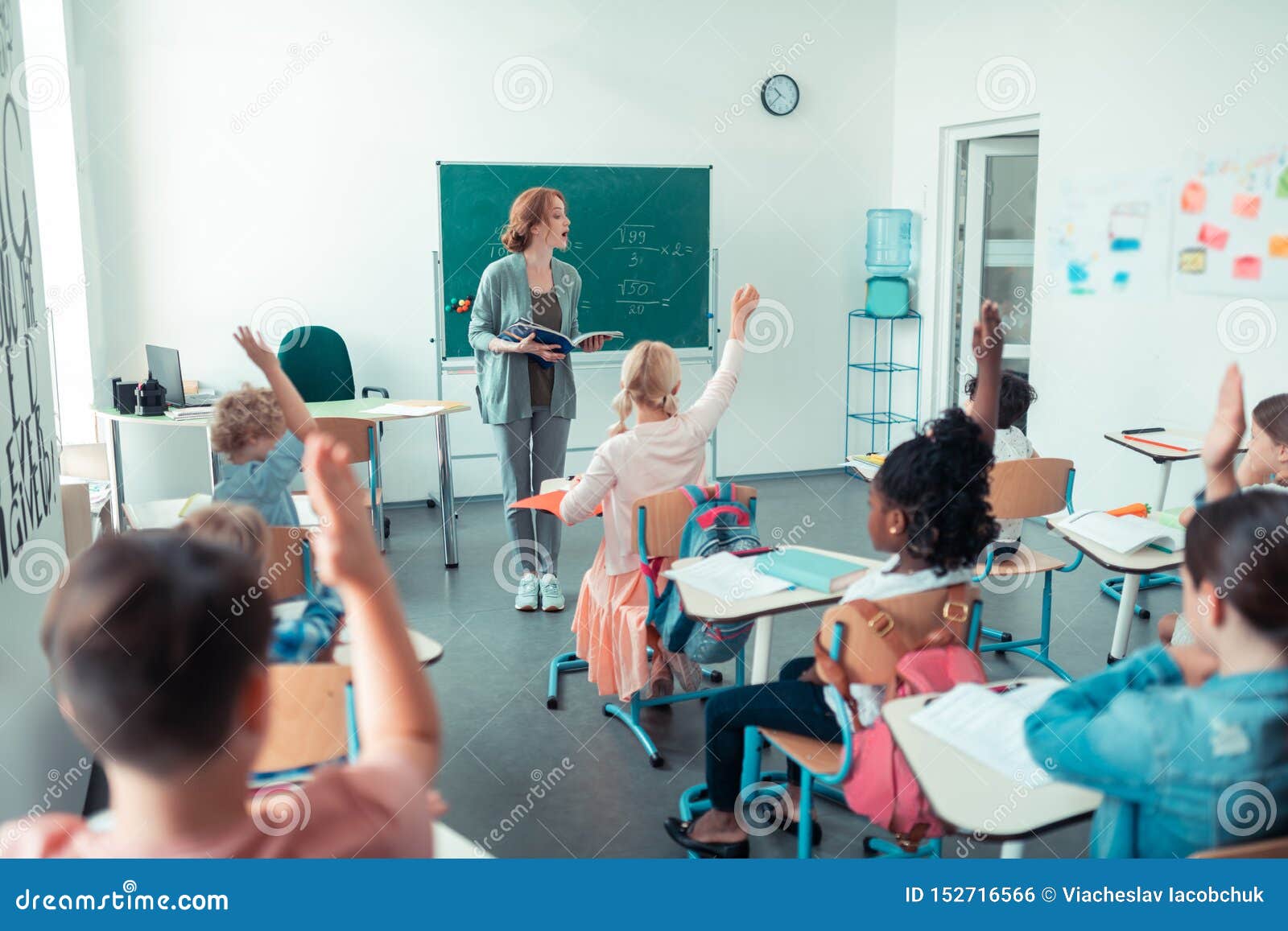 Maths Teacher Calling a Pupil To the Blackboard. Stock Photo - Image of ...