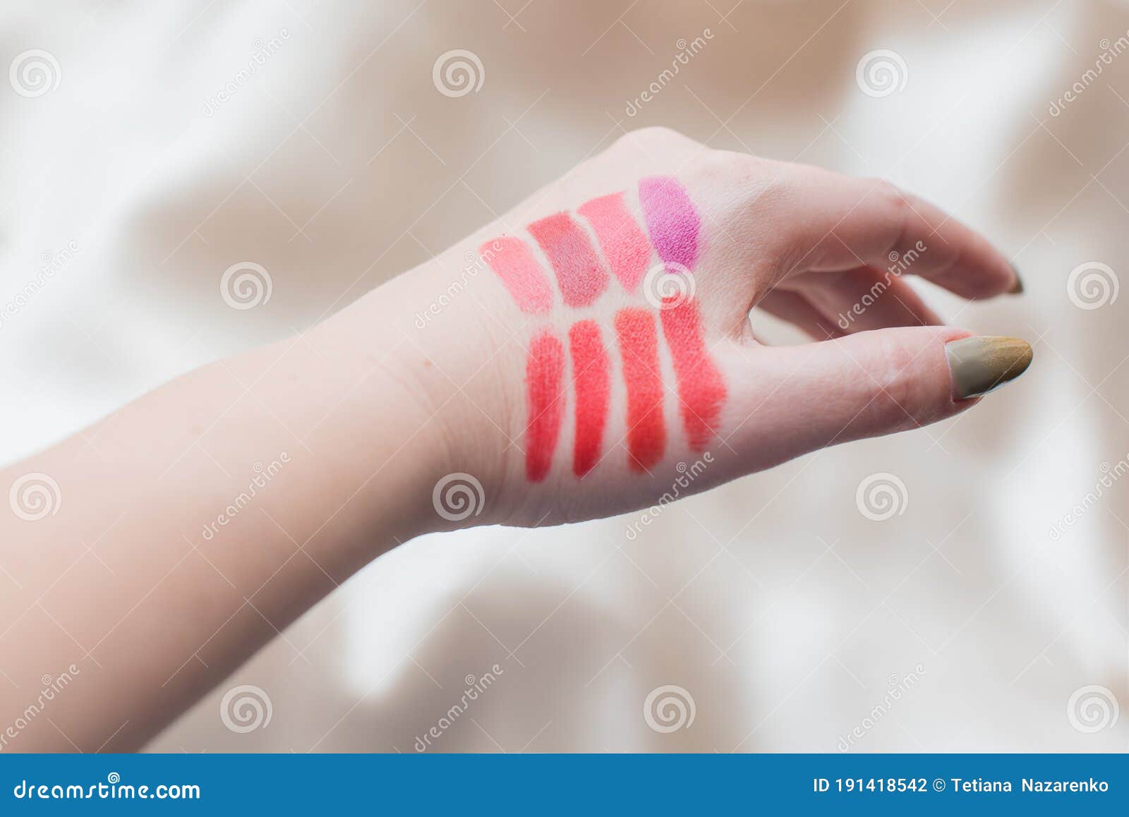 Lipstick colors on a hand stock photo. Image of design - 191418542