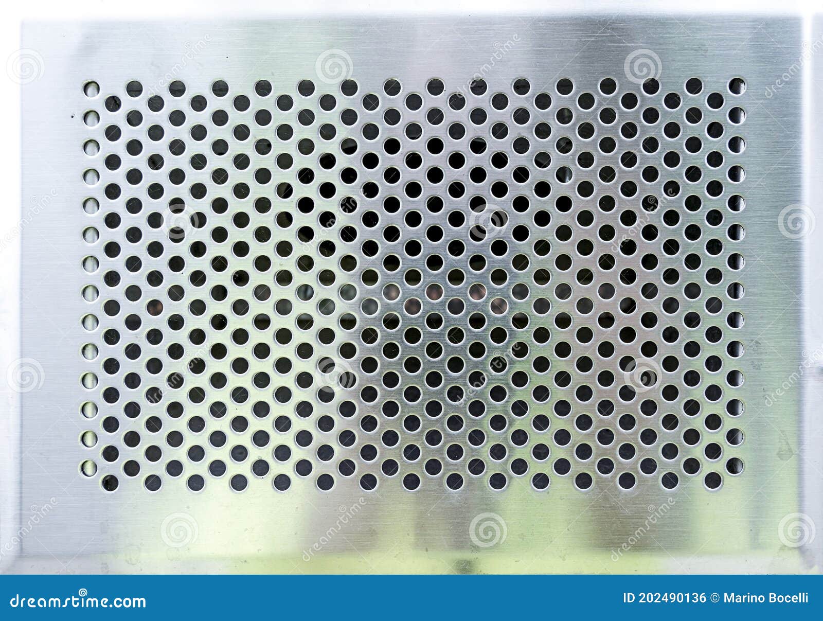 Matte Metal Panel Covered with Holes Stock Photo - Image of shiny ...