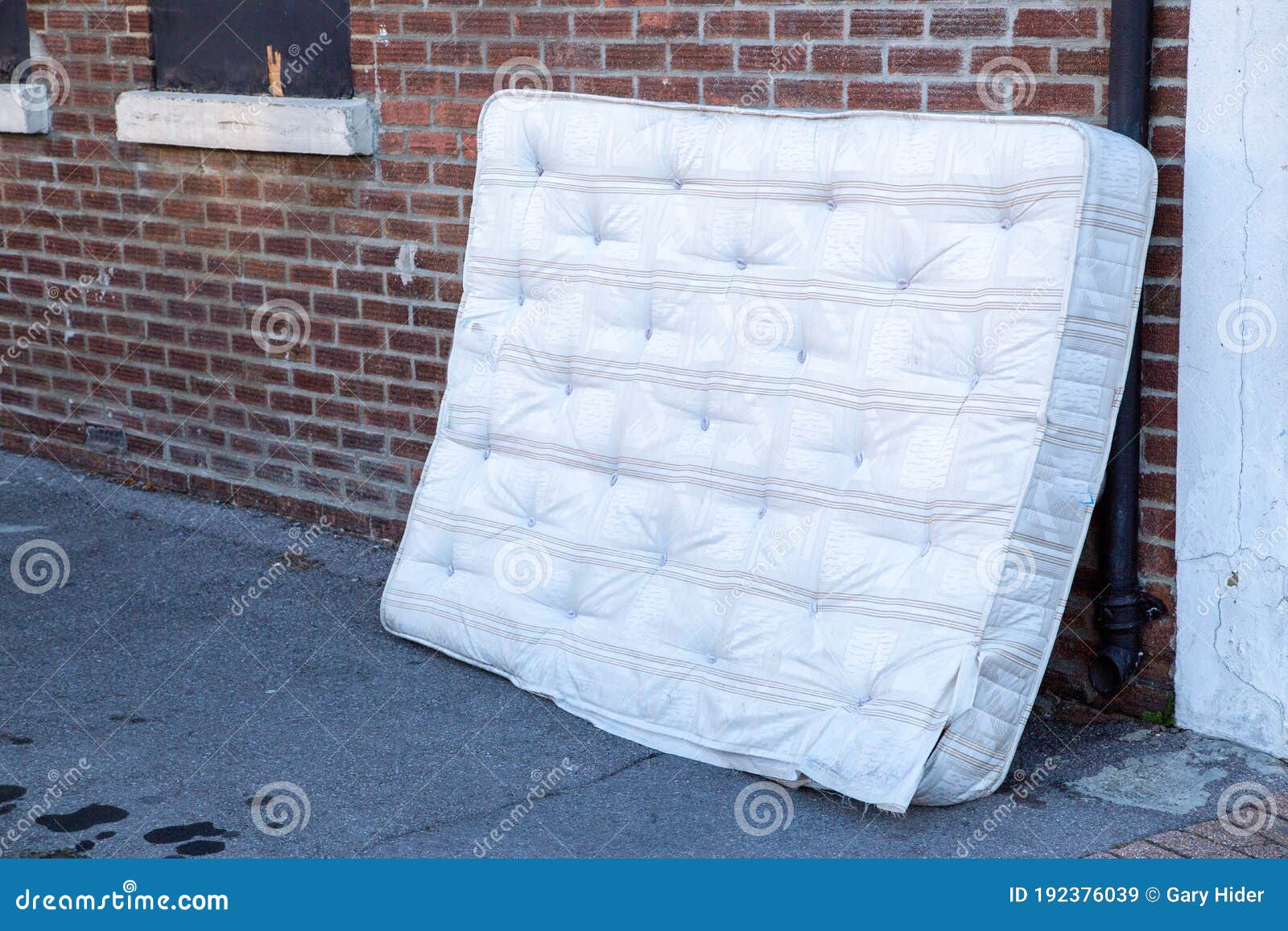 A Mattress Dumped or Fly Tipped in the Street Stock Image - Image of ...