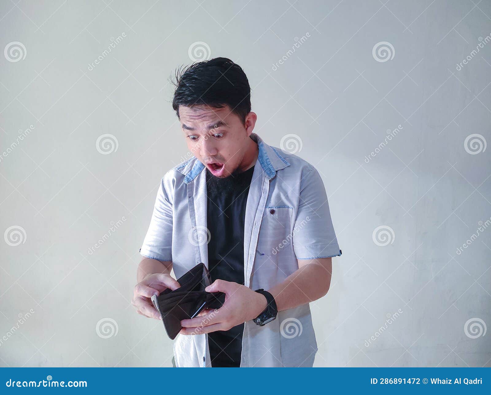 A Mature Asian Man is Opening His Empty Wallet Stock Photo - Image of ...