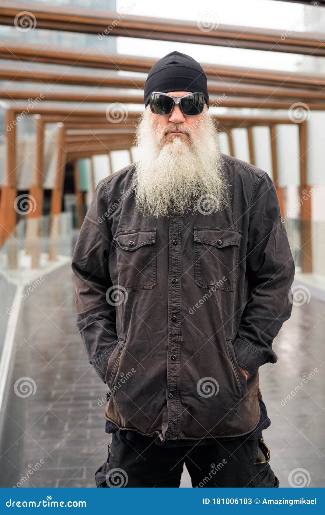 Mature Bearded Man With Sunglasses At Footbridge In The City Stock