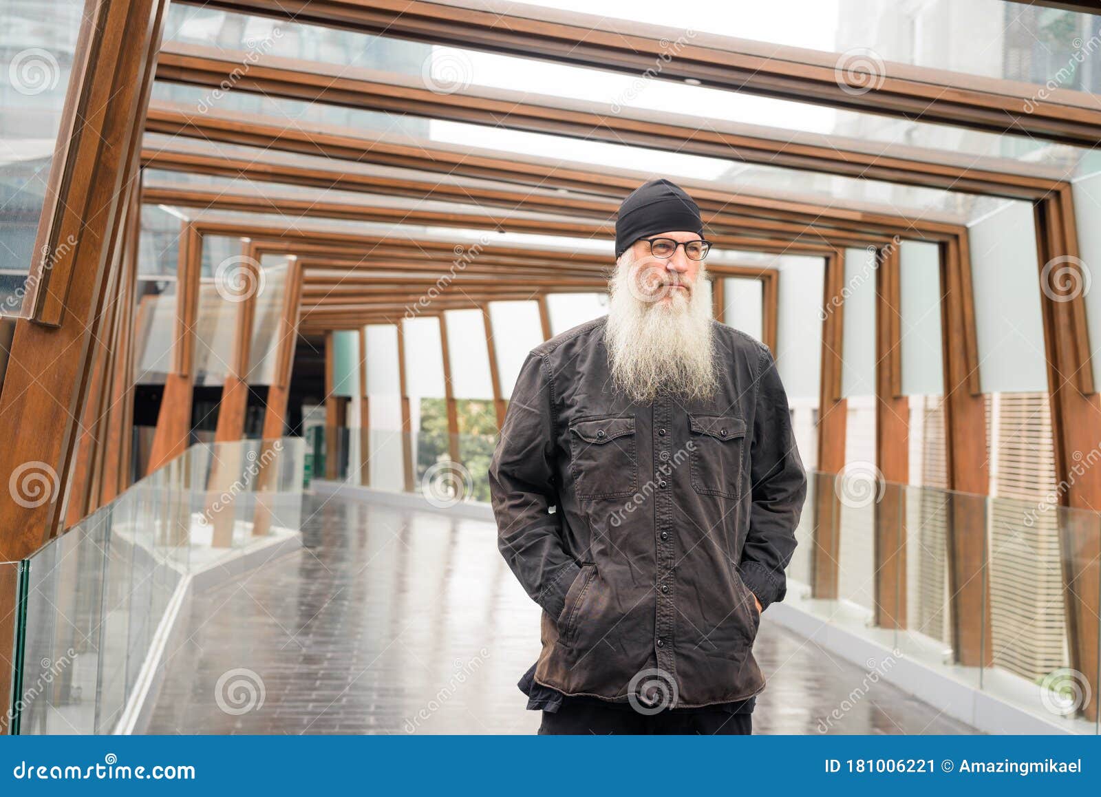 Mature Bearded Man Thinking At Footbridge In The City Stock Image