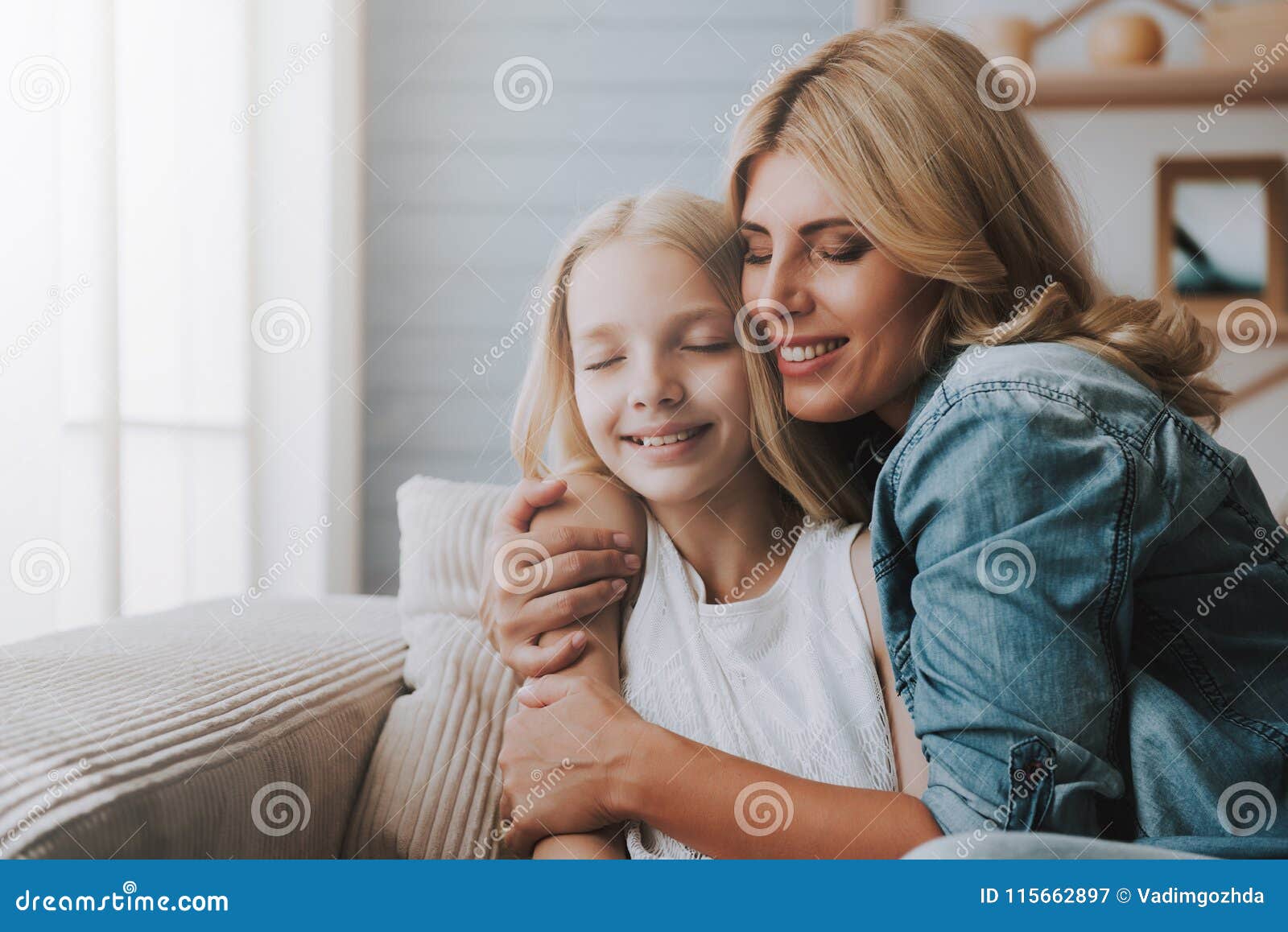 Mature Blonde Woman Hugging Daughter Concept Of Reconciliation Of