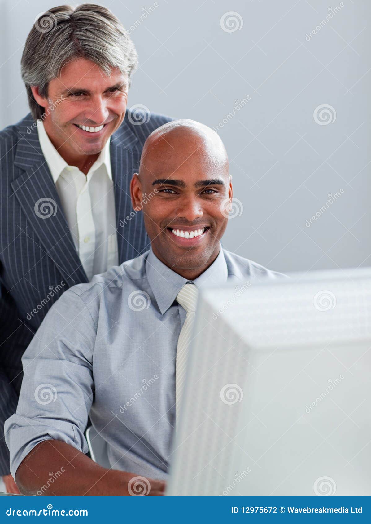 Mature Businessman Helping His Colleague Stock Photo - Image of meeting ...