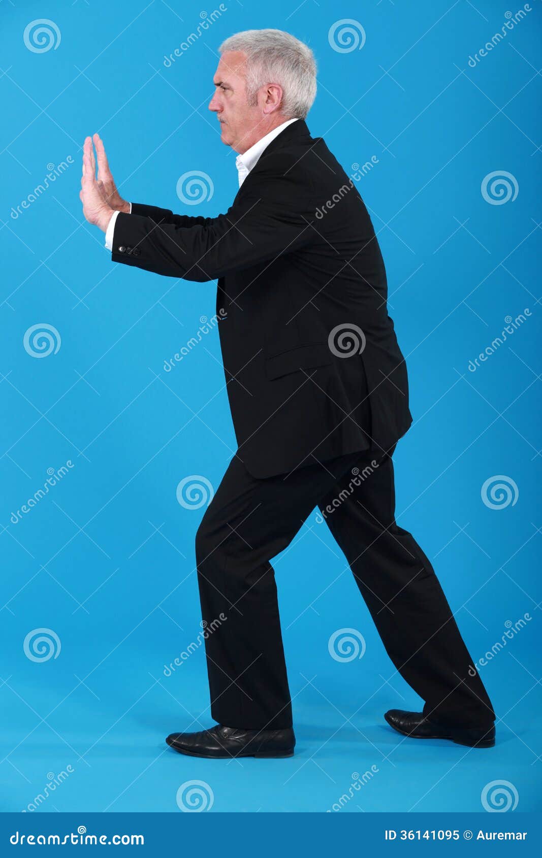 A Mature Businessman Miming. Stock Image - Image of faking ...