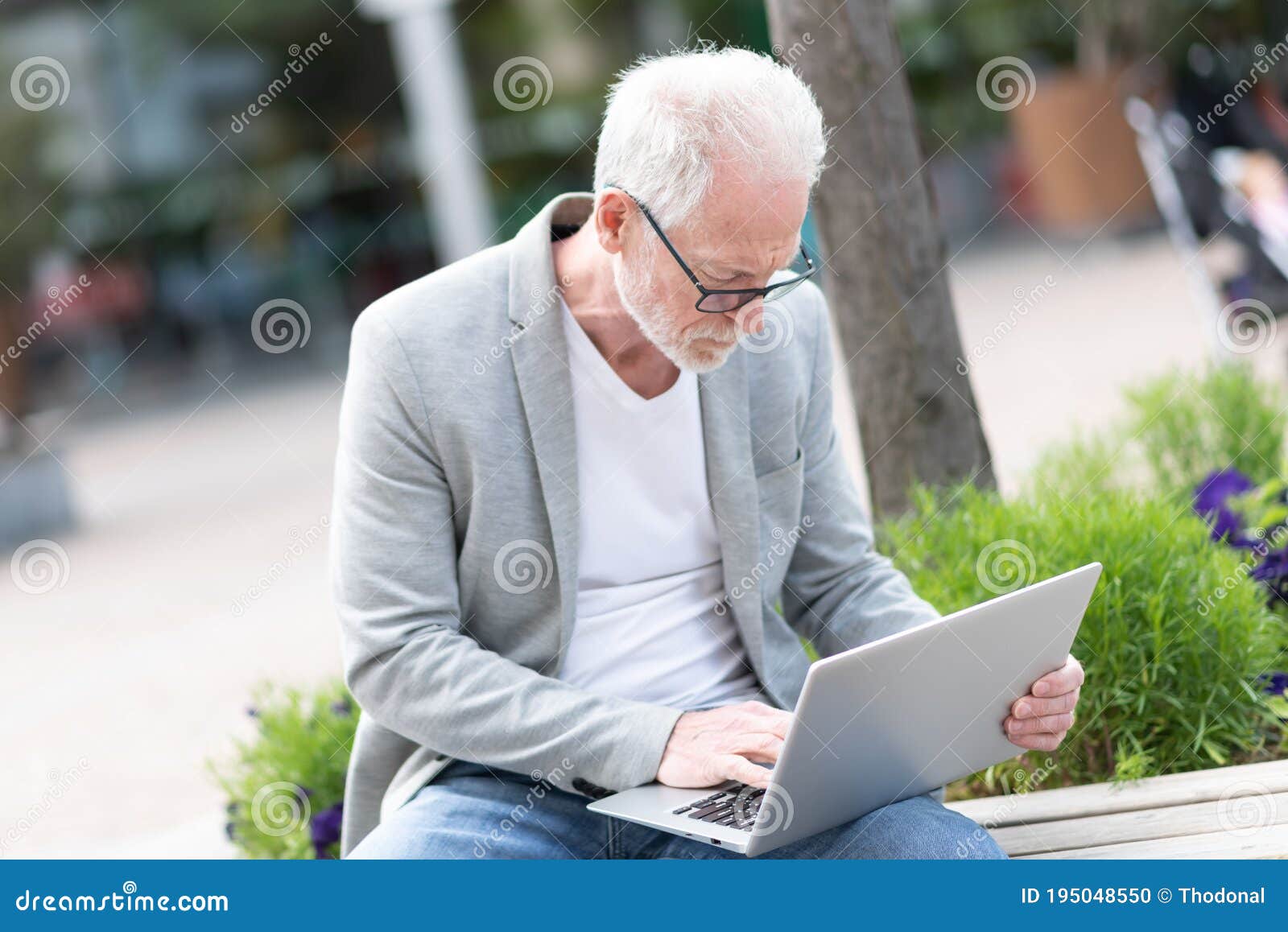 Mature Businessman Using Laptop Outdoors Stock Photo - Image of senior ...
