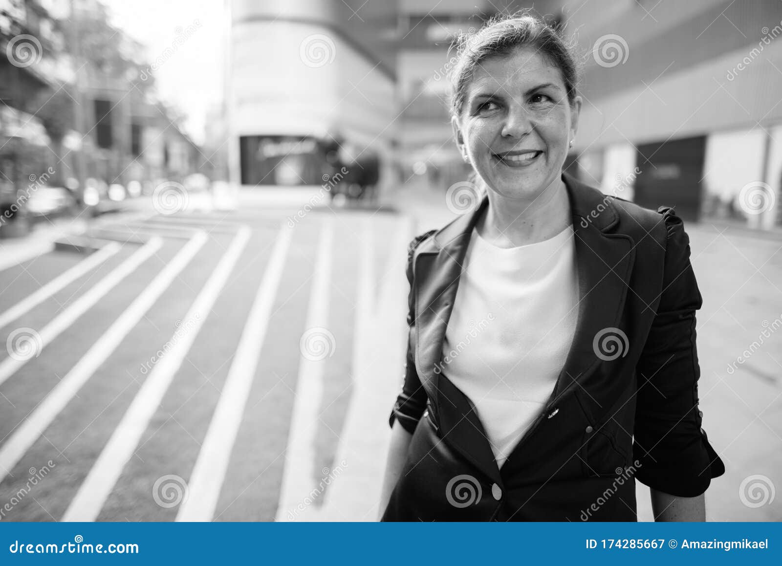 Mature Businesswoman Exploring The City Of Bangkok Thailand Stock