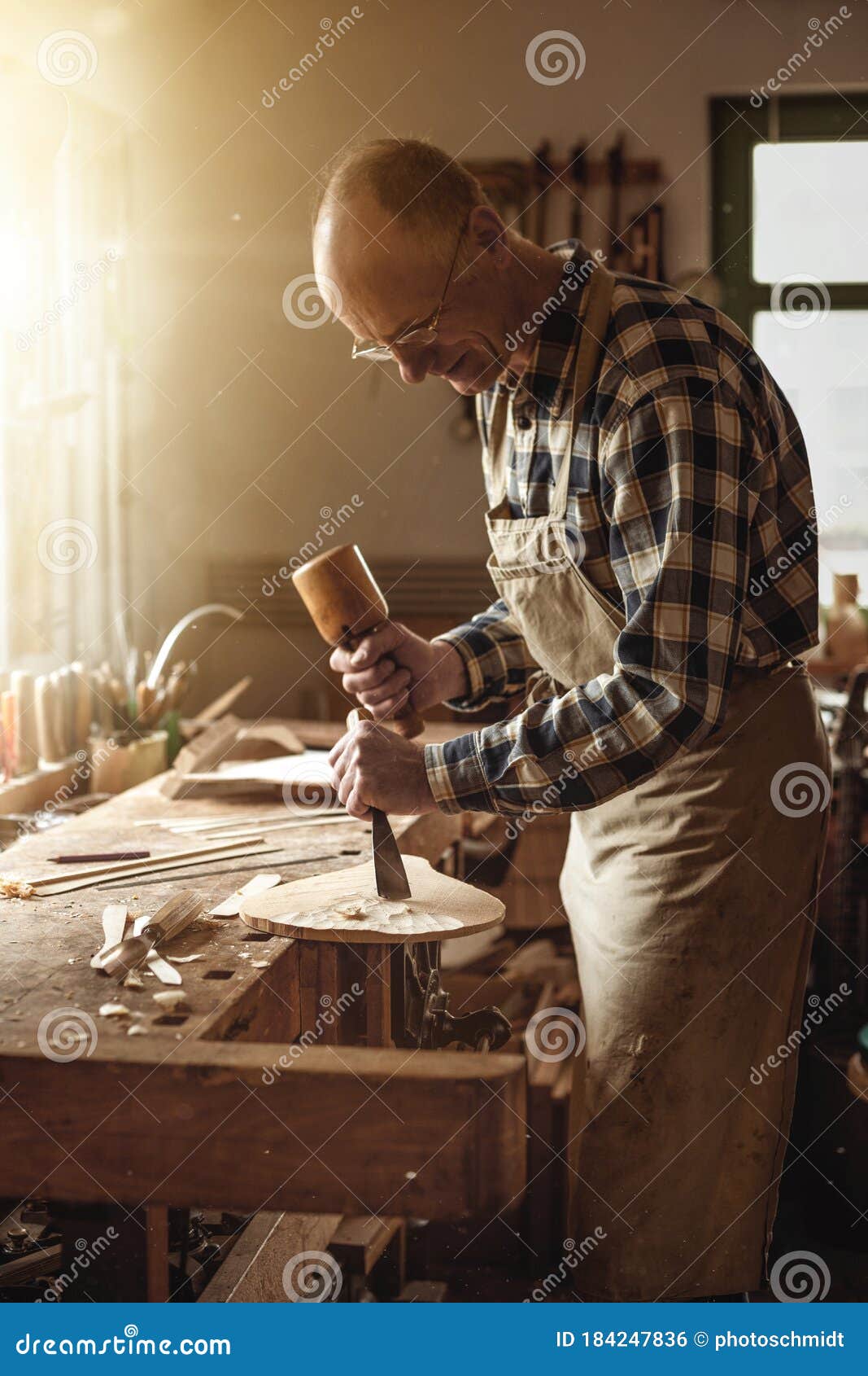 Mature Carpenter Working in a Rustic Workshop Stock Photo - Image of ...