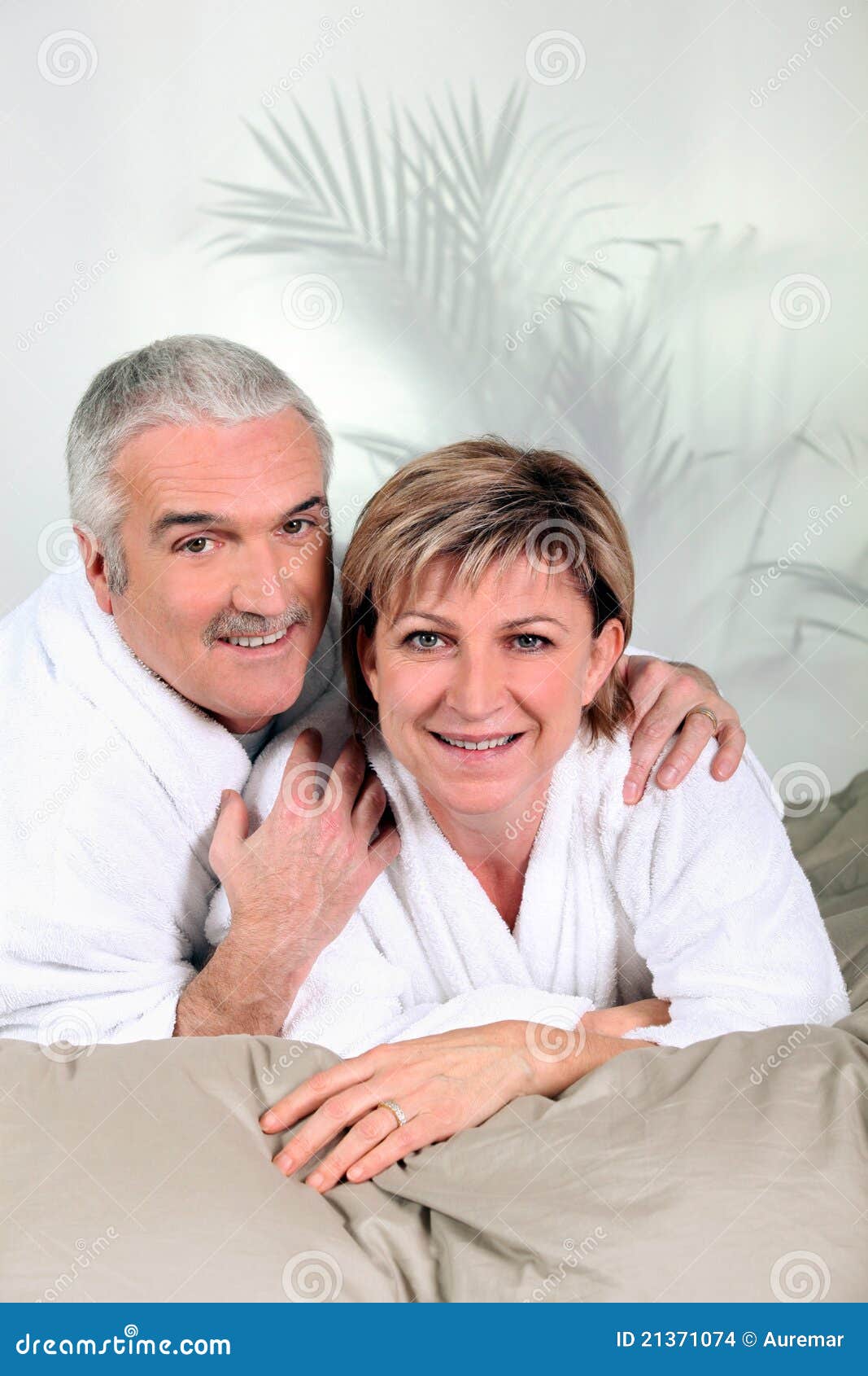 Mature couple in the bed stock photo. Image of lifestyle - 21371074