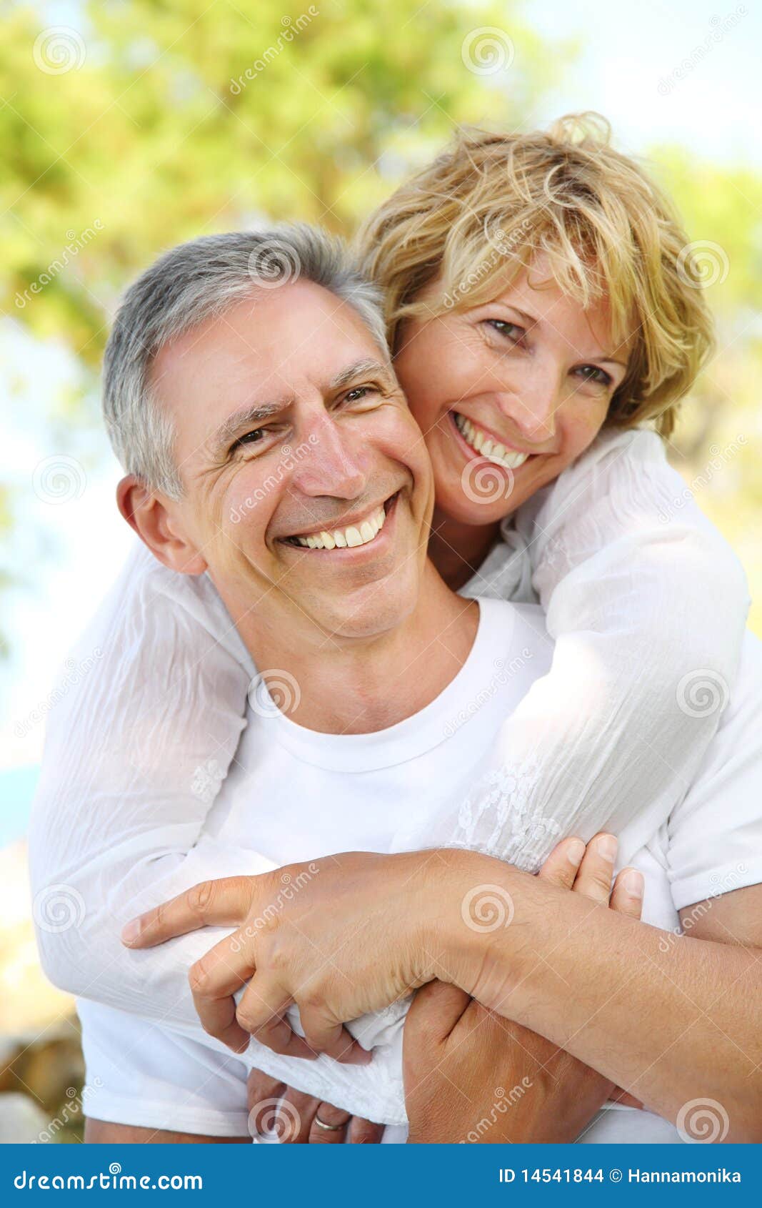 Mature couple smiling stock photo. Image of colour, grey - 14541844