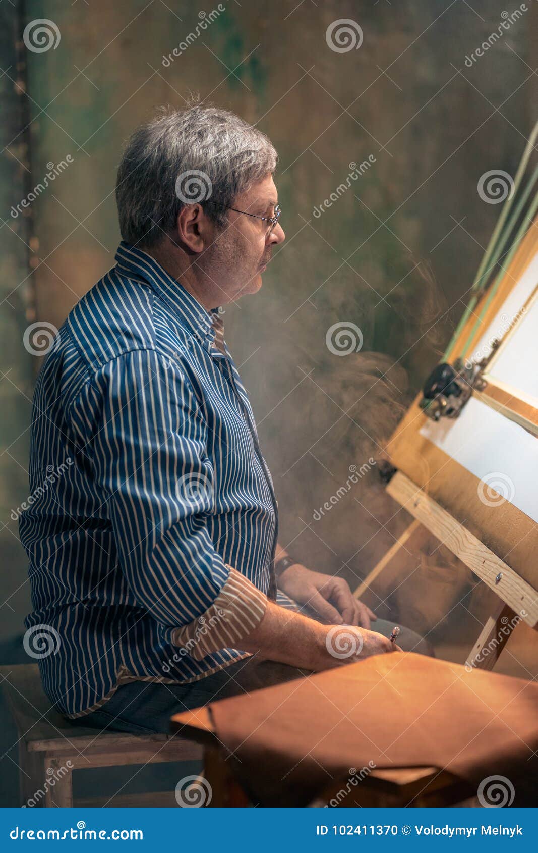 The Mature Creative Engineer Working with Project on Drawing Board ...