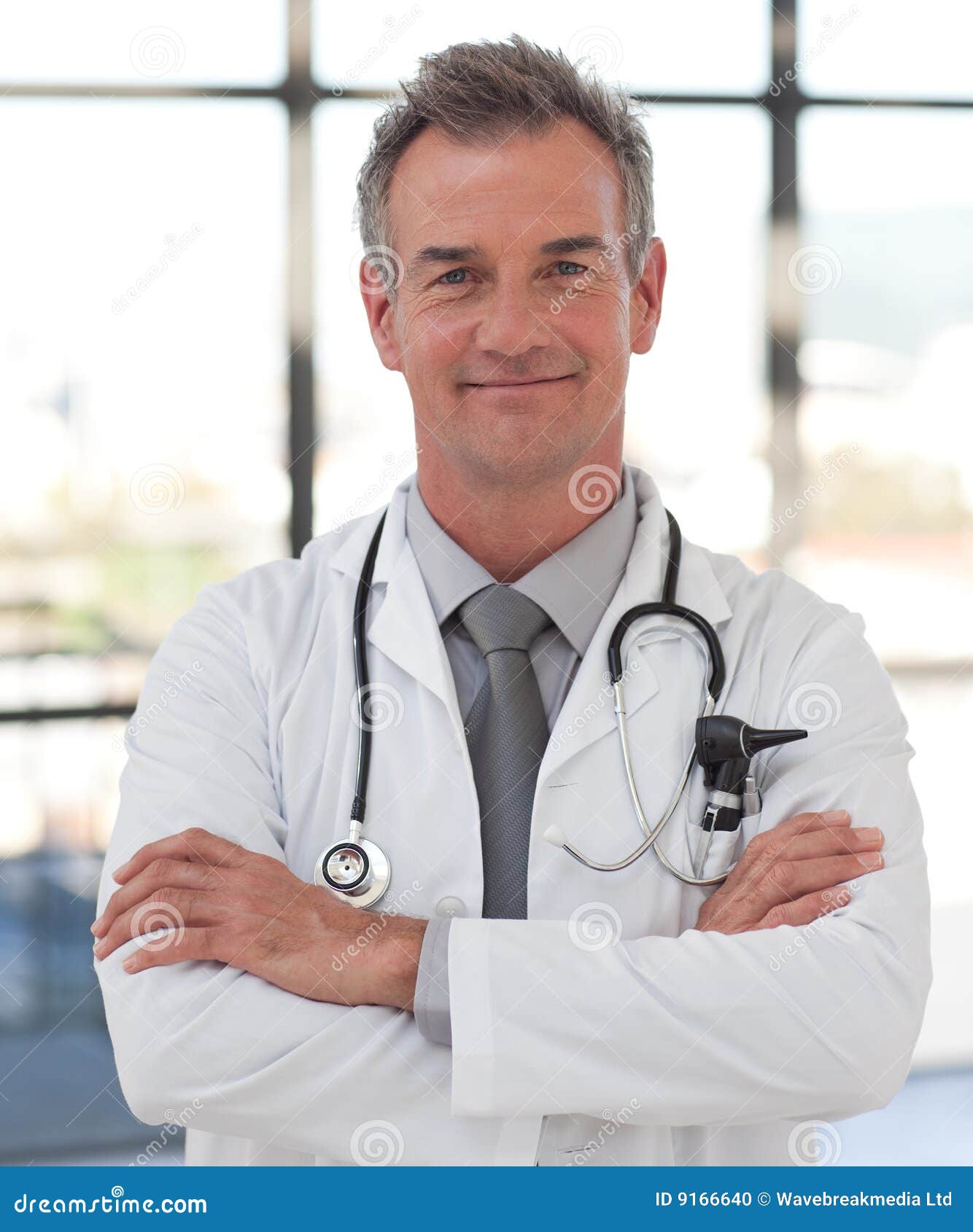 Mature Doctor Smiling stock photo. Image of gray, collar - 9166640