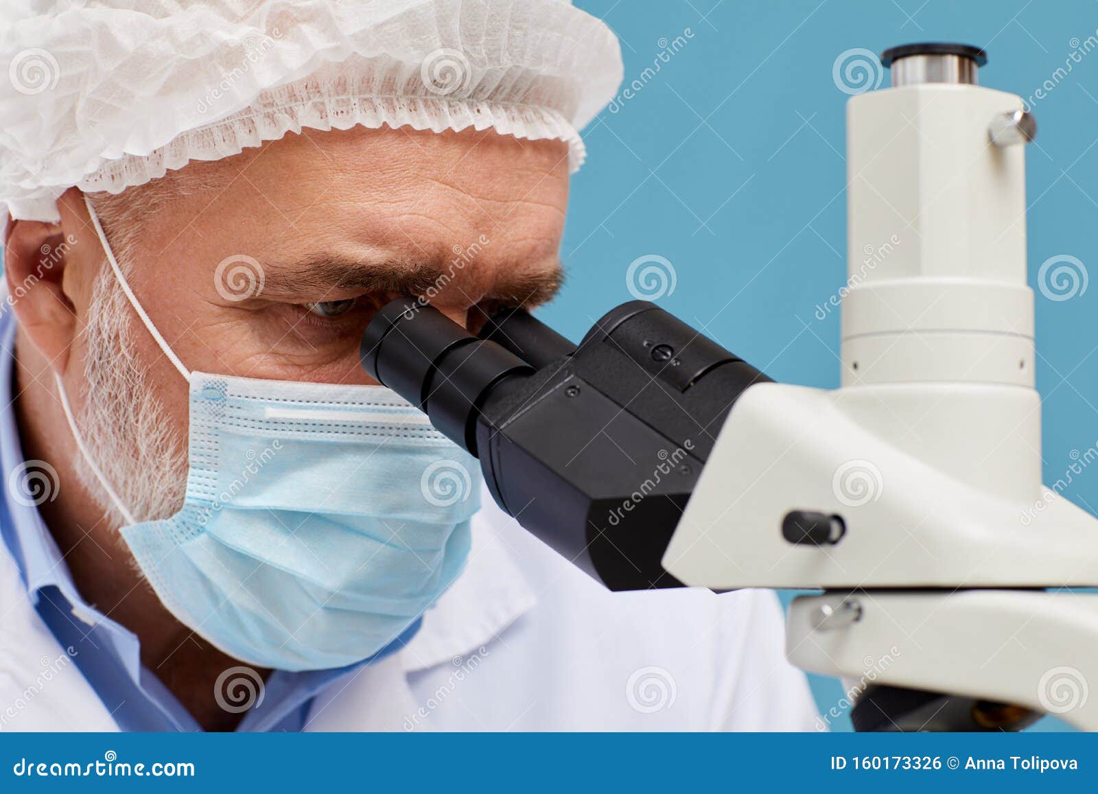 Mature Doctor Using Microscope Stock Photo - Image of people, equipment ...