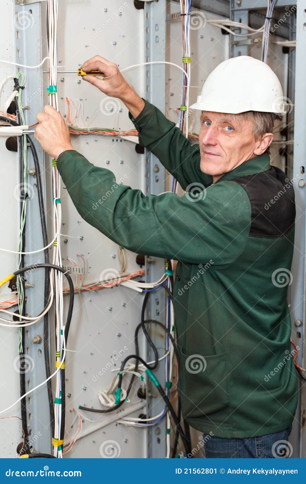 Mature Electrician Working in Hard Hat with Cables Stock Image - Image ...