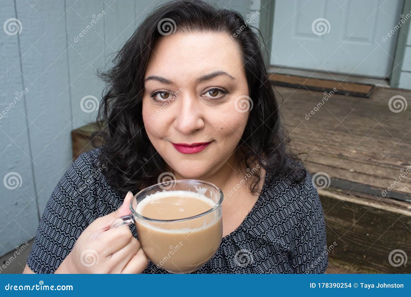 Mature Ethnic Model with Red Lips and Dark Hair Drinks Coffee Stock ...