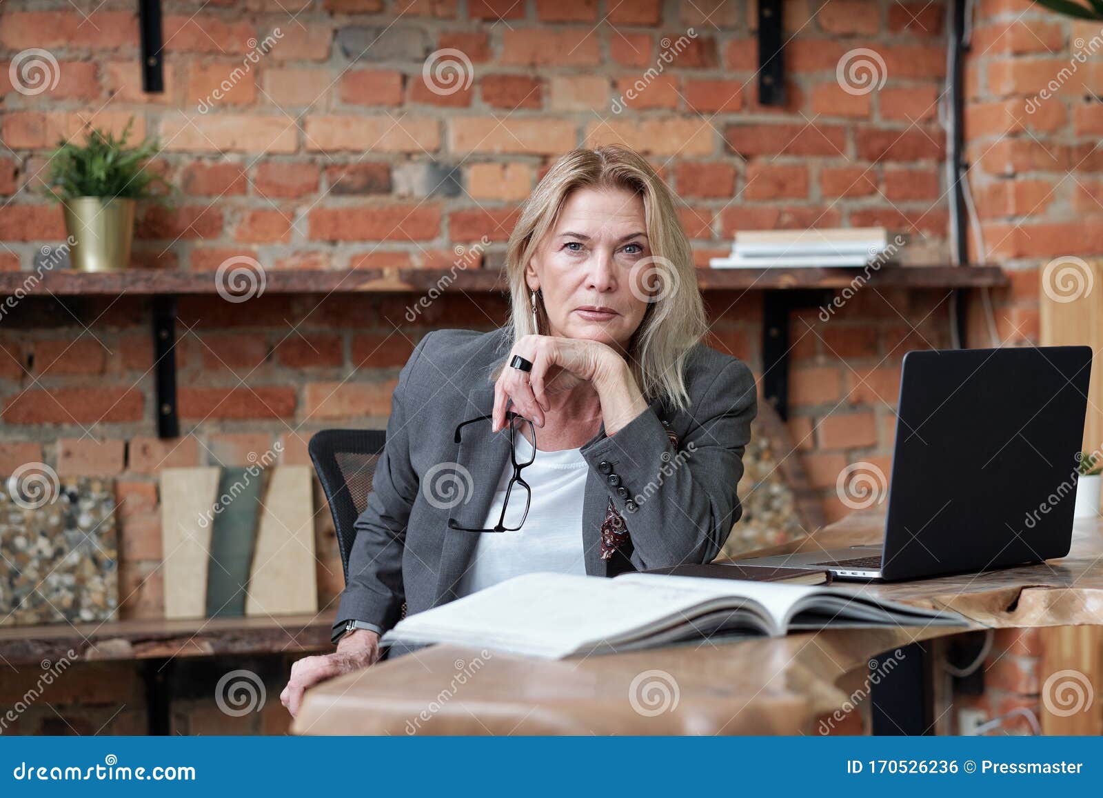 Mature female accountant stock photo. Image of serious - 170526236