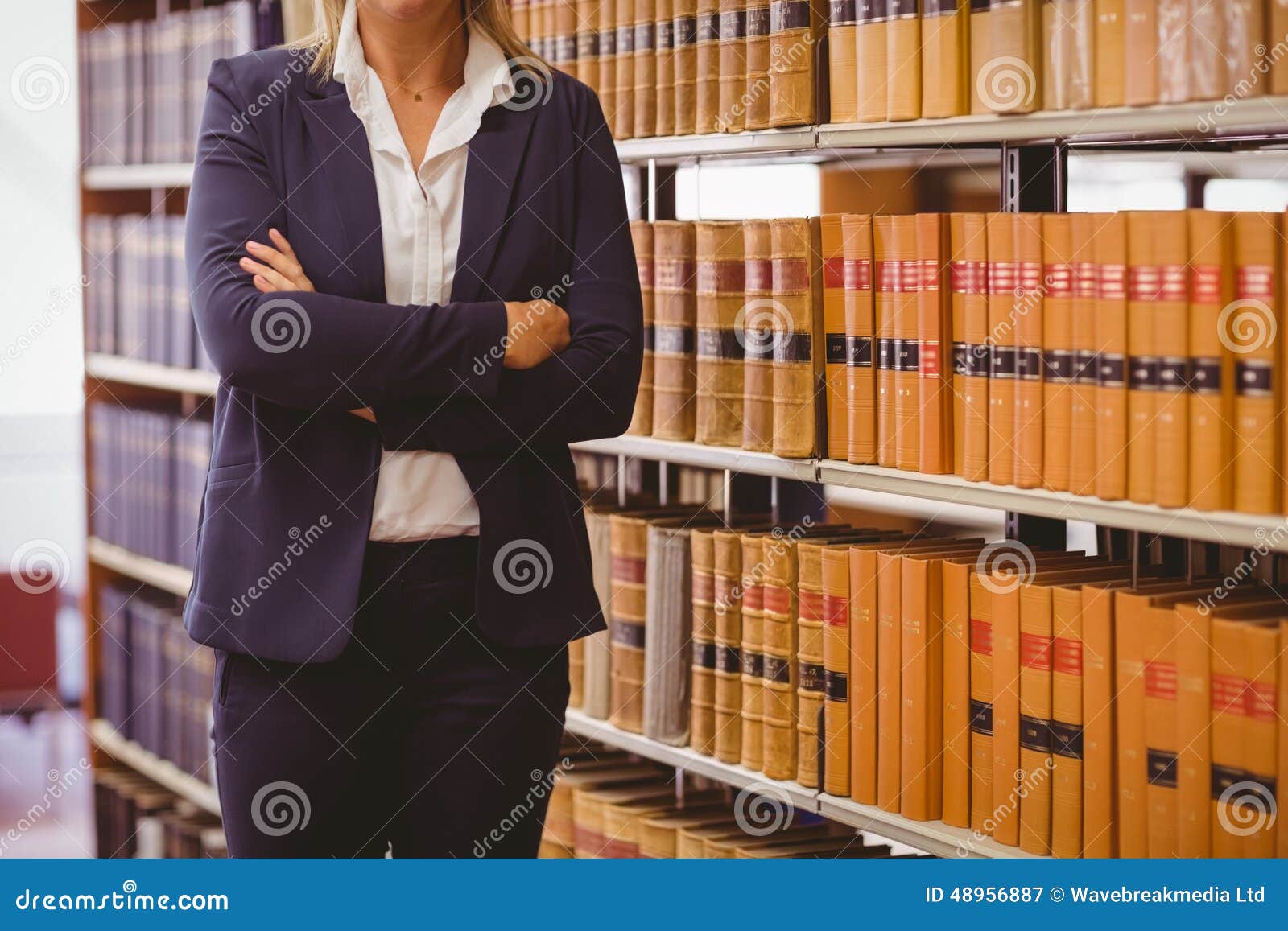 Mature Female Librarian Posing with Crossed Arms Stock Image - Image of ...
