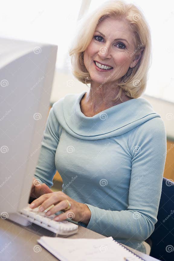 Mature Female Student Learning Computer Skills Stock Image - Image of ...