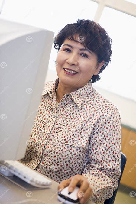 Mature Female Student Learning Computer Skills Stock Image - Image of ...