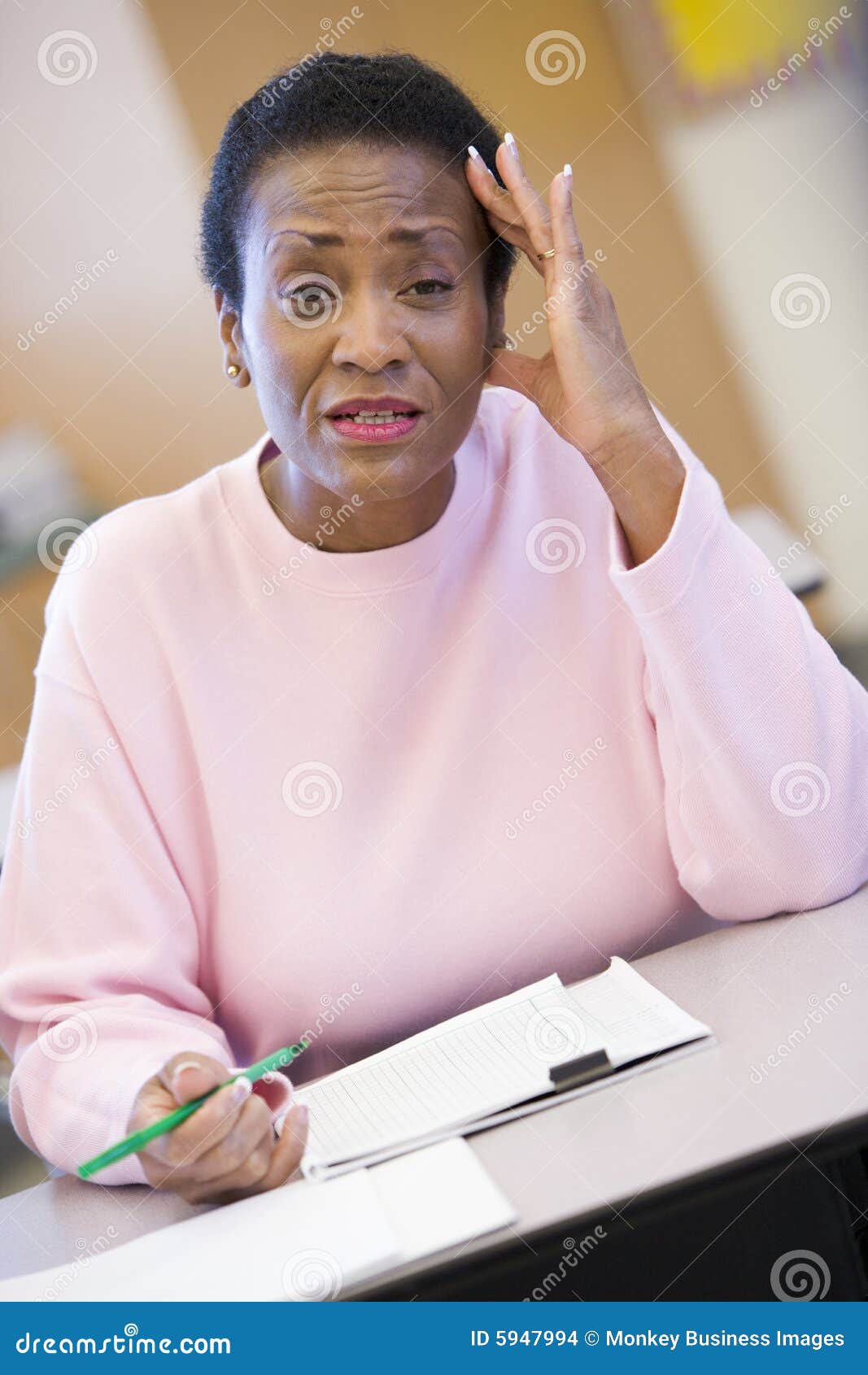 Mature Female Student Looking Confusion in Class Stock Photo - Image of ...