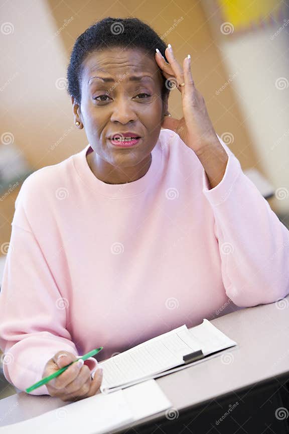 Mature Female Student Looking Confusion in Class Stock Photo - Image of ...